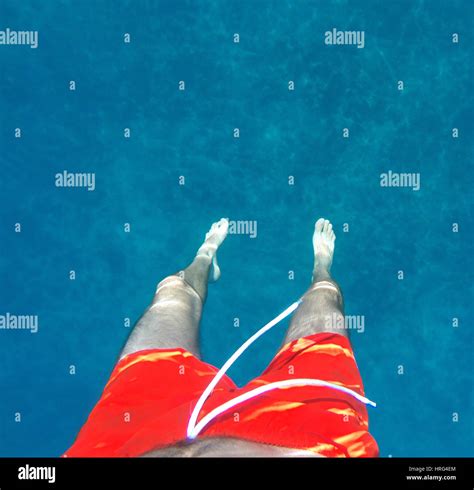 Man Floating In Sea Water Stock Photo Alamy