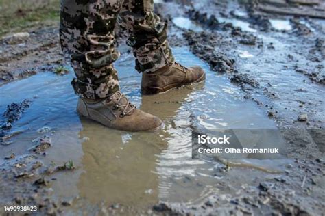 Armed Forces Of Ukraine Ukrainian Soldier Brown Military Boots On Mud