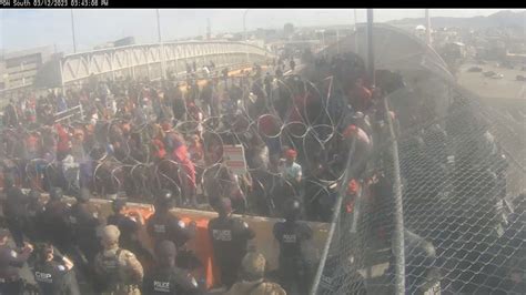 Border Crisis Over 1000 Migrants Rush Bridge Linking Mexico To Us In