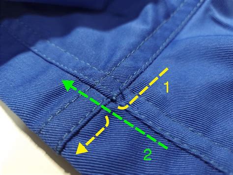 existing row of topstitching severed by needle r sewing