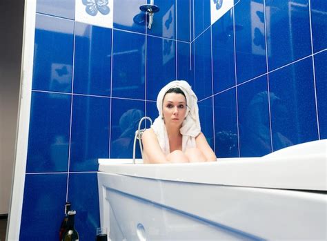 Premium Photo Portrait Of Woman Taking Bath