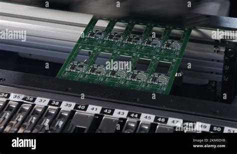 SMT Machine Places Resistors Capacitors Transistors LED And Integrated Stock Video Footage