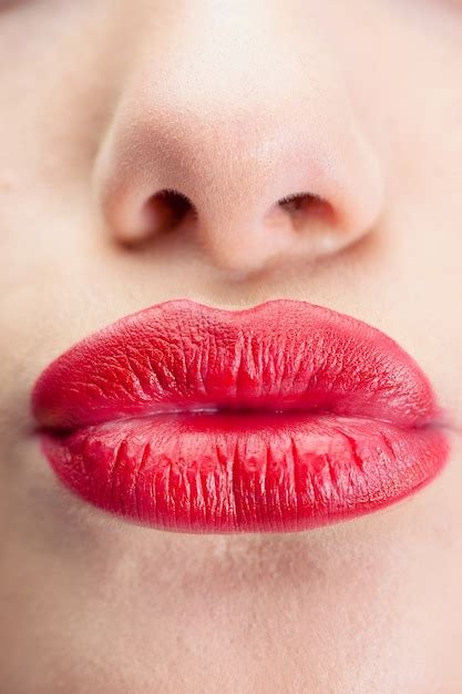 Premium Photo Extreme Close Up On Gorgeous Red Lips Kissing At Camera