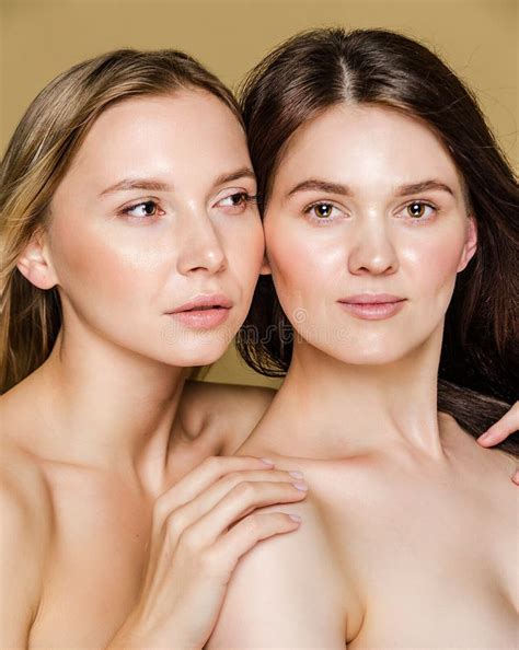 Two Young Women With Beautiful Skin In Studio Stock Image Image Of