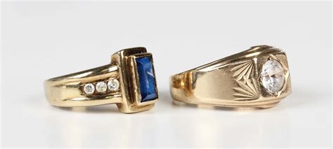 A 9ct Gold Synthetic Blue Spinel And Colourless Gem Set Ring London