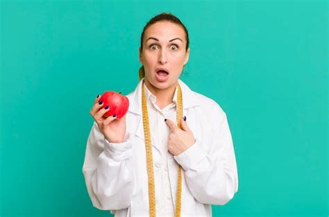 Premium Photo Looking Shocked And Surprised With Mouth Wide Open