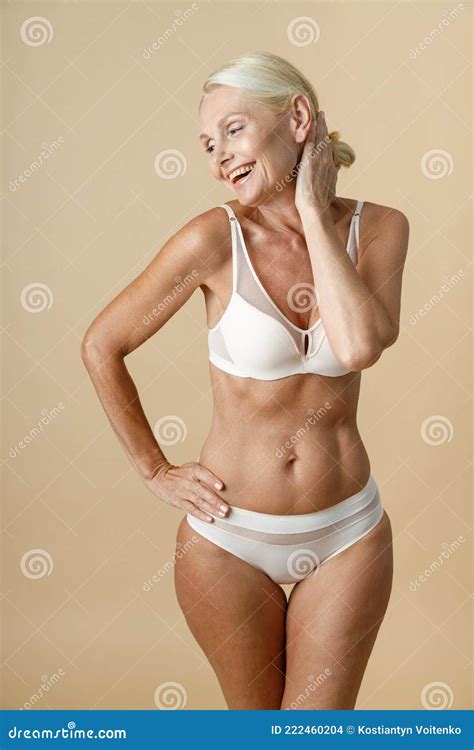 Charming Mature Woman In Underwear With Fit Perfect Body Smiling And