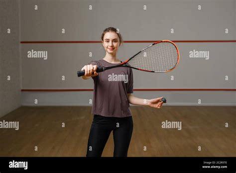 Female Player Shows Squash Racket On Court Girl On Game Training Female Player Shows Squash Racket On Court Girl On Game Training