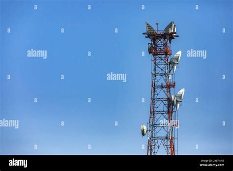 A Lonely Cellular Network Tower Is Seen Against A Clear Blue Sky Gps 3g 4g 5g Signal