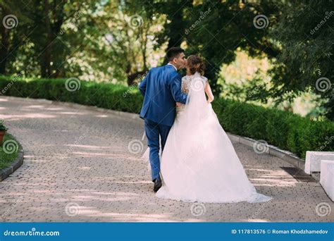 The Bride And Groom Decided To Escape From Their Wedding And Are In A Hurry So That No One Sees