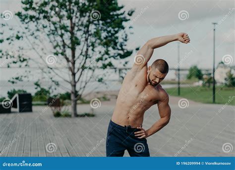 Man With Torso Muscular Macho And His Reflexion In Mirror Background Man With Nude Torso In