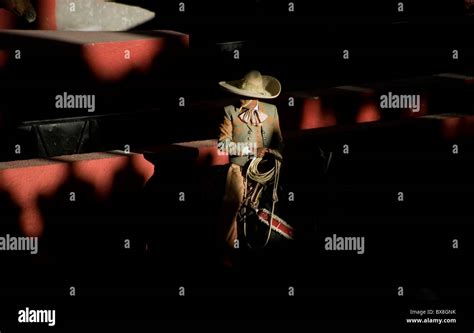 A Mexican Charro Holds His Lasso At The National Charro Championship In