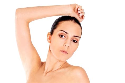 Premium Photo Portrait Of Young Woman Against White Background
