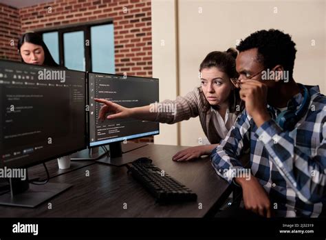 Caucasian Software Developer Signaling On Screen Data Breach And