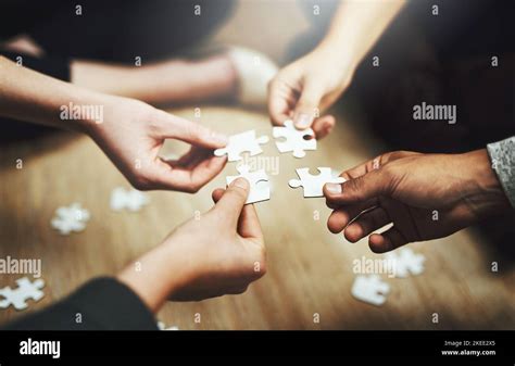 Pulling Together To Solve A Problem A Group Of Unrecognizable People