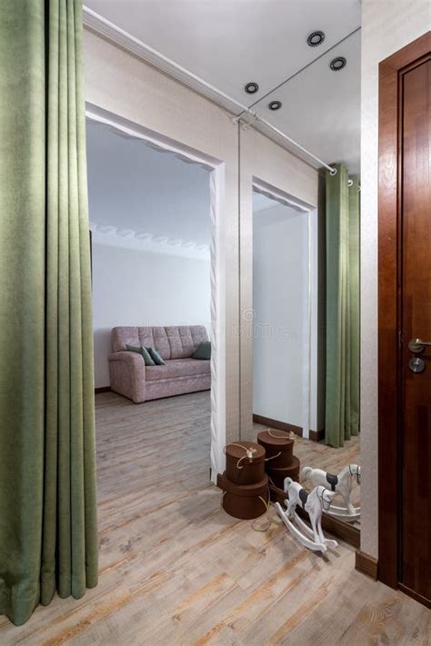 Modern House Interior Hallway Decor Elements With Front Door And Segments Of Luxury Furnishing