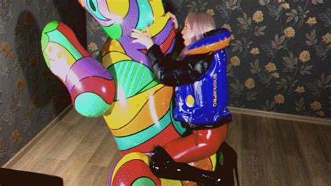 Alla Hotly Fucked A Big Inflatable Rhinoceros Alla Wears An Inflatable Vest And A Down Jacket