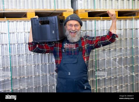Joyous Mature Loader Showing Off His Strength Before The Camera Stock Photo Alamy