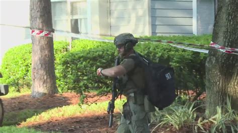 Swat Team Seen With Assault Rifles At Woodhollow Apartments In