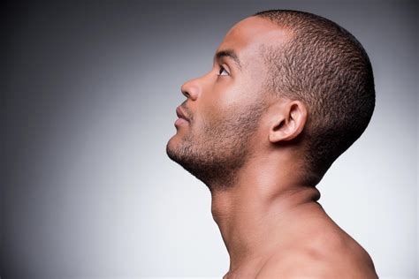 Confidence And Masculinity Side View Of Young Shirtless African Man