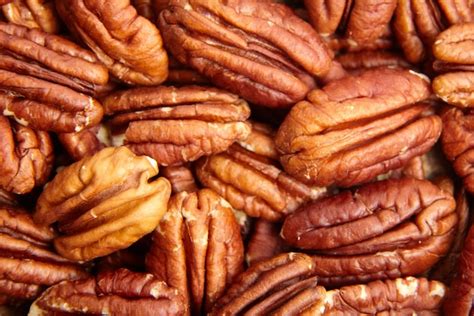 Premium Photo Pecan Nuts Kernel Texture Background Closeup Heap Of