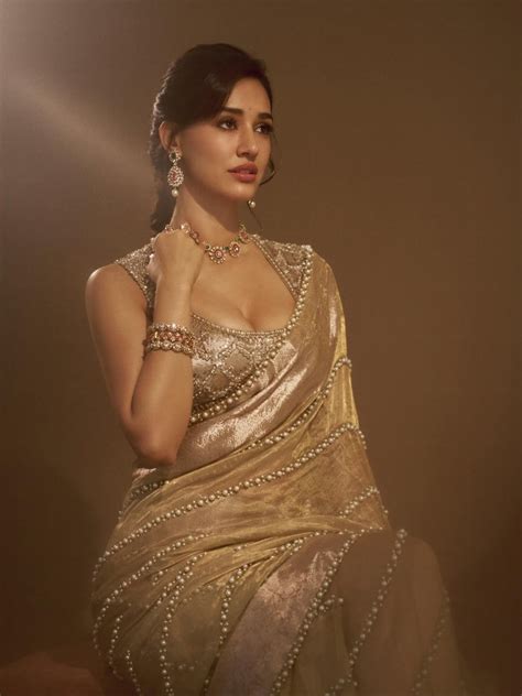 Disha Patani Stuns In Gold Saree Look Disha Patanis Royal Gold