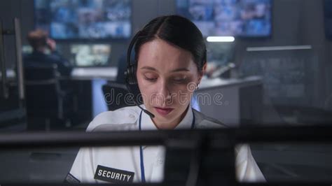 Female Worker Of Security Monitoring Center In Headset Stock Video Video Of Professional