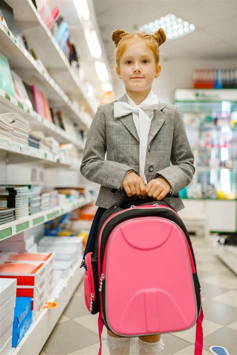 Schoolgirl With Backpack In Hand Stationery Store Stock Image Image