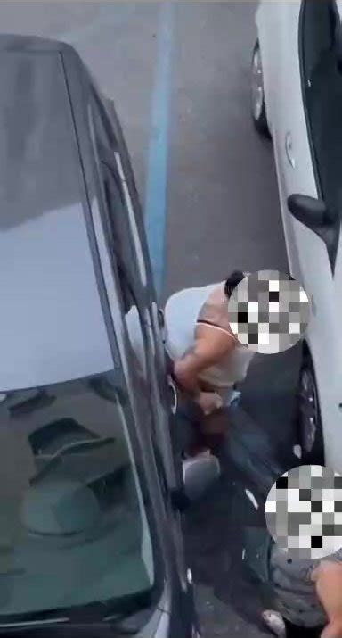 Two Women Pee In A Parking Thisvid Com
