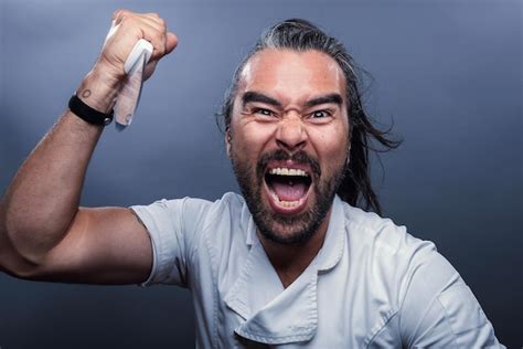 Premium Photo Closeup Shot Of A Male Chef Screaming At The Camera
