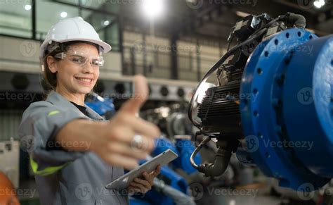 A Female Engineer Completed The Updating Software And Calibrating A