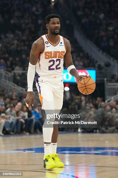 Deandre Ayton Of The Phoenix Suns Dribbles The Ball Against The News