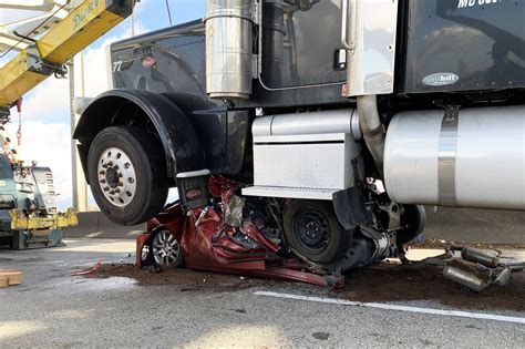 Woman Escapes With Minor Injuries After 18 Wheeler Crushes Car