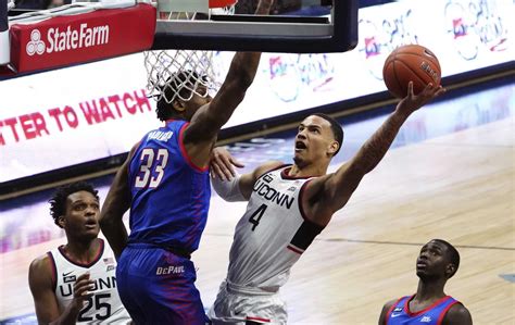 Tyrese Martin Steps Up Late Leads 25th Ranked Uconn Men Over Depaul