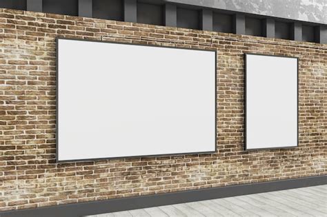 그림자와 햇빛이 있는 벽돌 야외 벽에 걸려 있는 빈 흰색 포스터 빌보드 상업 및 광고 개념 3d 렌더링 프리미엄 사진