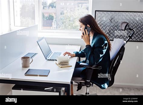 Young Female Programmer Web Developer Working On Computer Software In