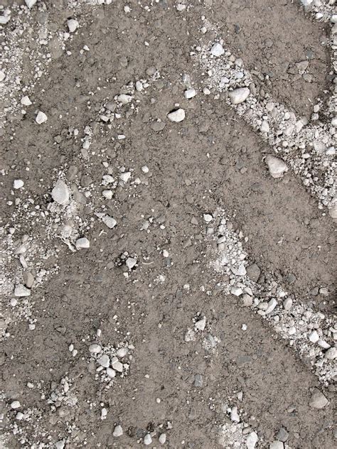 Uneven Gray Soil Surface With Tire Tracks Free Stock Photo FreeImages