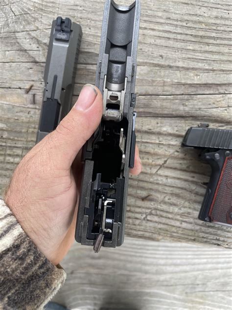 Has Anybody Else Had Trouble With The Trigger Return Spring On A Tp9 Sf Elite First Time Taking