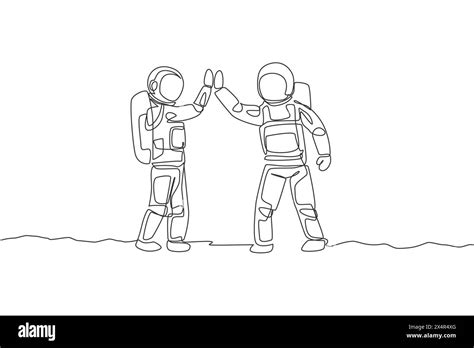 One Single Line Drawing Of Two Young Happy Astronauts Gave High Five While Meeting On The Street