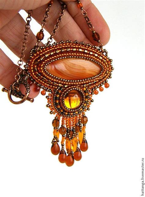 Купить или заказать Кулон Солнце в ладони в интернет магазине на Ярмарке Мастеров Теплая и