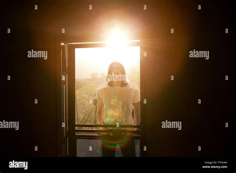 Man Standing At Window Hi Res Stock Photography And Images Alamy