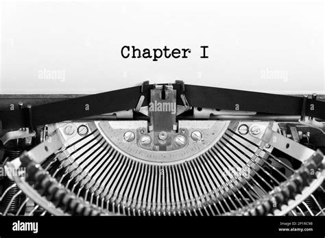 Chapter One Phrase Closeup Being Typing And Centered On A Sheet Of