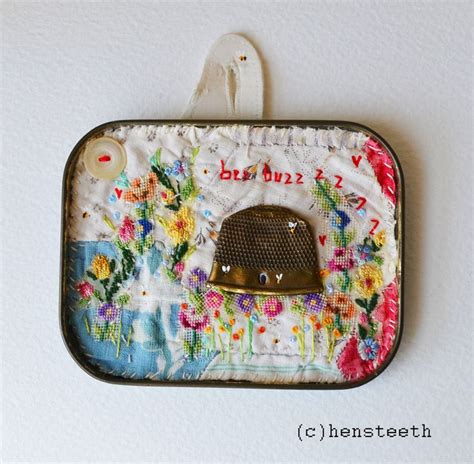 Altered Tin Artwork With Flowers And Unique Design