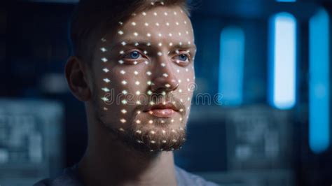 Handsome Young Caucasian Man Is Identified By Biometric Facial Recognition Scanning Process