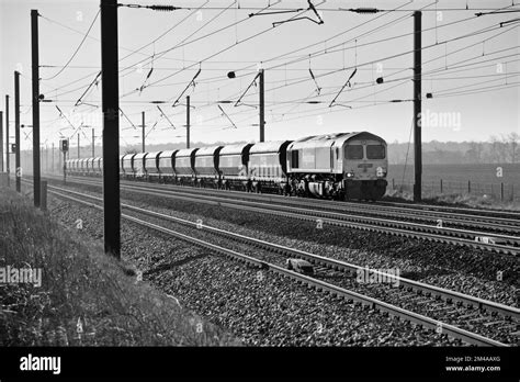 Freightliner Class 66 Diesel Locomotive 66953 Hauling An Empty Merry Go
