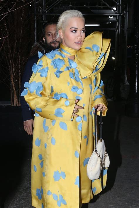 Rita Ora In A Yellow And Blue Dress And Pink Stockings 02132019