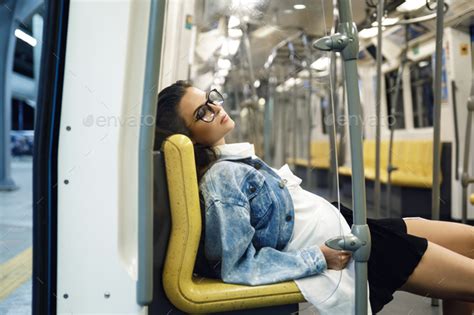 Sexy Model Is Posing In Carriage Of Metro Train Stock Photo By BLACKDAY