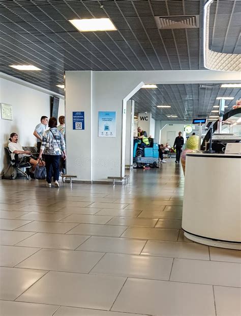 People In The Corridor To The Boarding Gates Editorial Stock Image