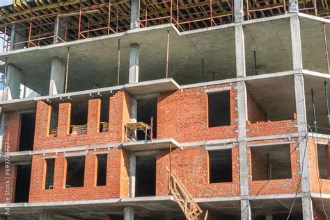 Installation Of Partitions And Exterior Walls Made Of Red Brick The