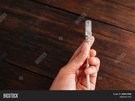 Man Holds Lan Cable Image Photo Free Trial Bigstock